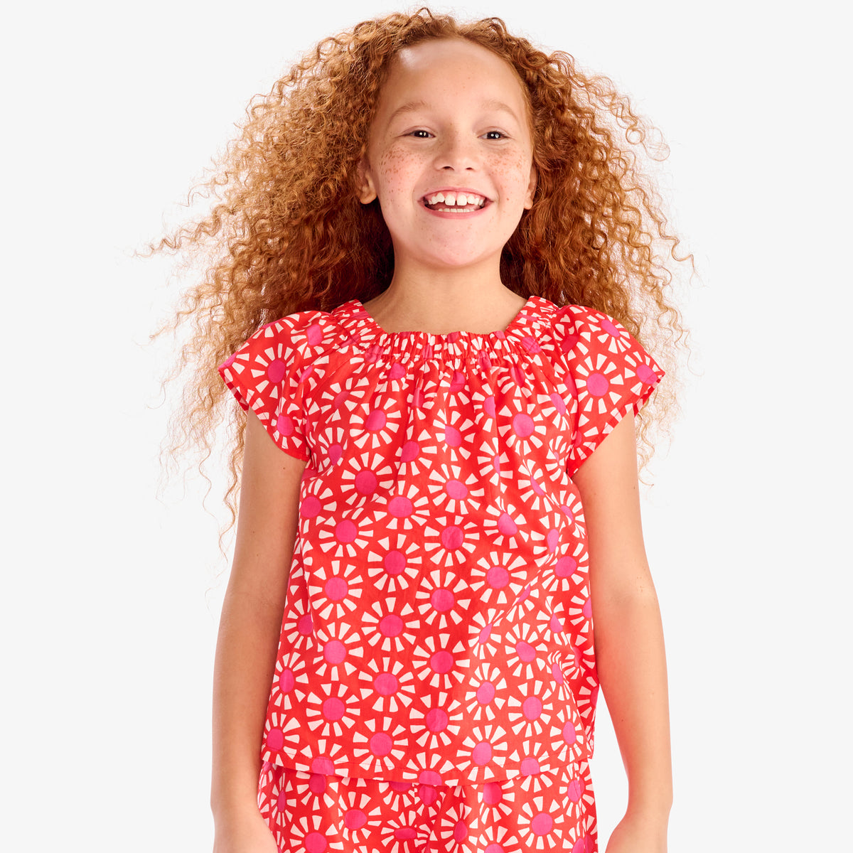 Kids picnic top in cutout suns | Primary.com