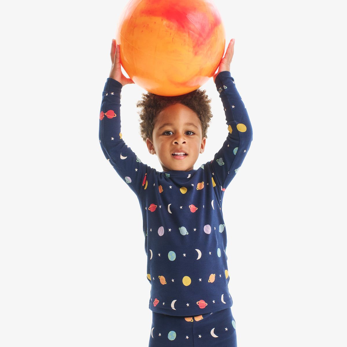 Kids organic long sleeve PJ top in rainbow galaxy | Primary.com