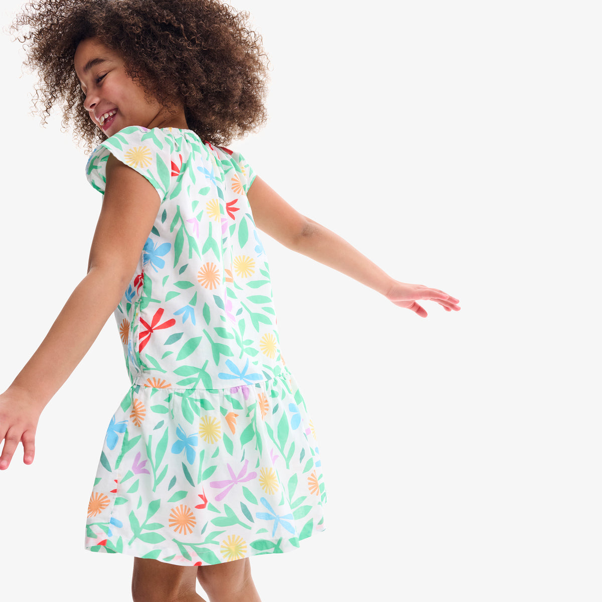 Kids swing dress in bright backyard | Primary.com